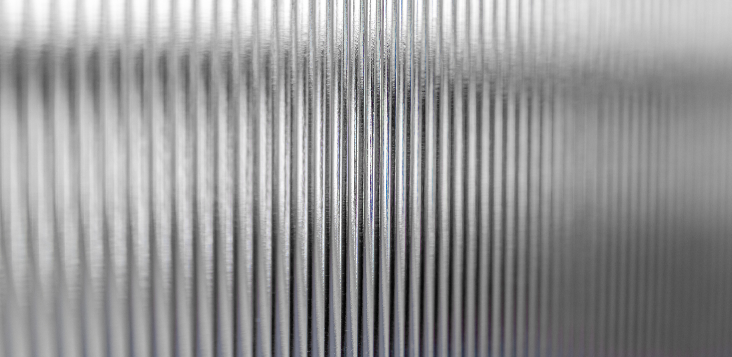 Häcker Kitchens debuts the Metal Frame Door with Grooved Glass, a new ...